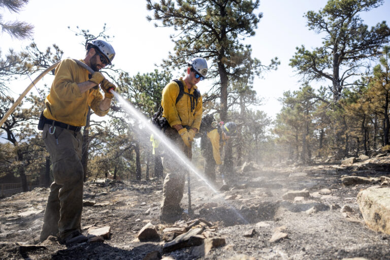 Firefighting Teams Make Progress on Containment of Wildfires in Western ...